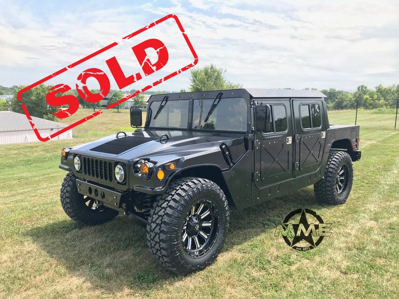 SWING OUT TIRE CARRIER FOR HMMWV/HUMVEE