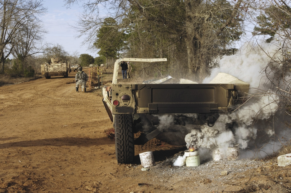 March 2, 2007 - A humvee burns after a simulated roadside bomb ...