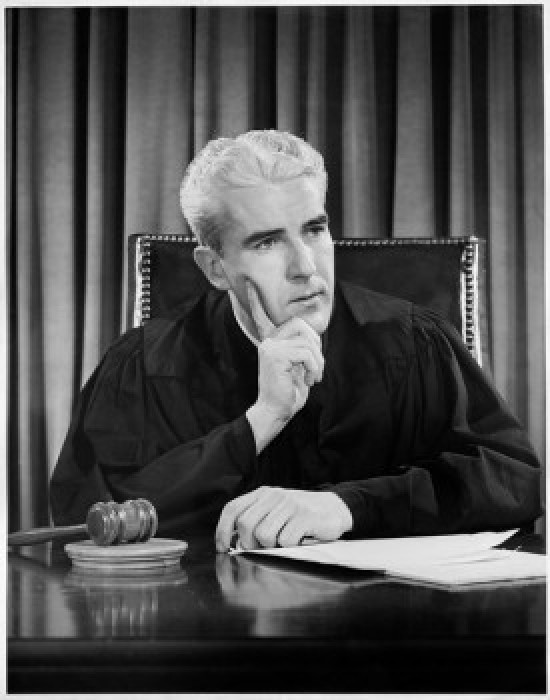 Close-up of a judge thinking with his hands on his chin Poster Print ...