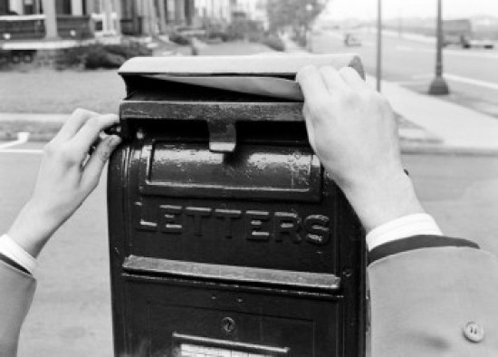 Hands mailing letter in letter box Poster Print - Item ...