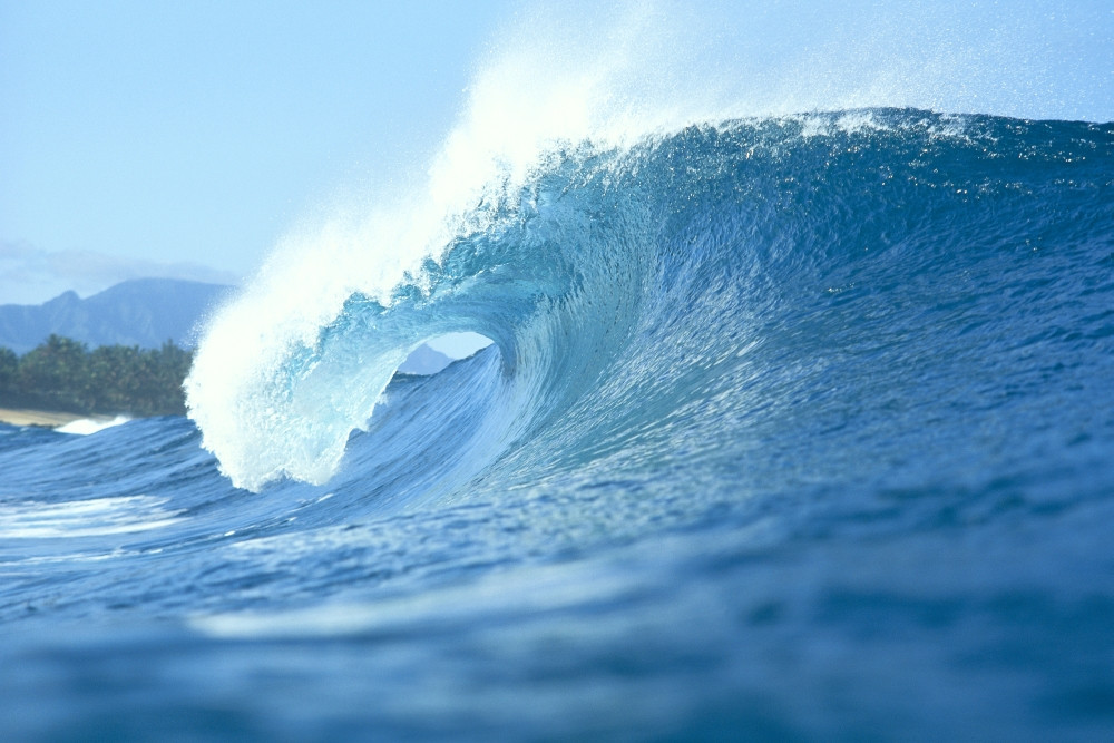 Side View Of Large Wave With Curl Breaks Toward Shoreline Spray Off ...