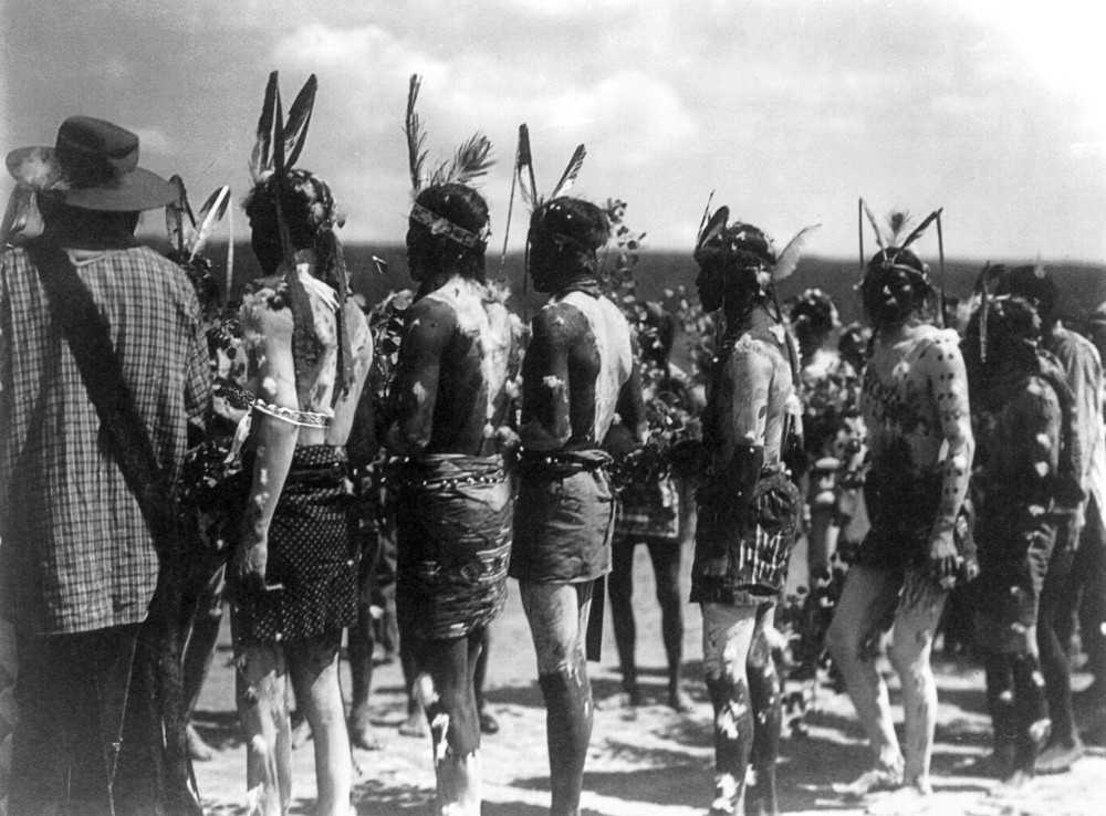 Apache Ceremony, C1905. /Ngroup Of Apache Men Wearing Feathered ...