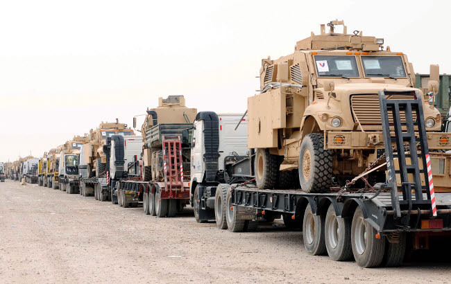 A convoy of Mine-Resistant Ambush Protected vehicles ready for ...