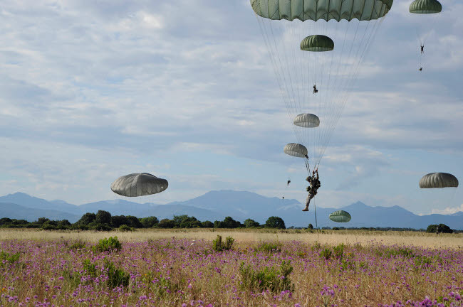US Army paratroopers descend to a drop zone in France Poster Print by ...