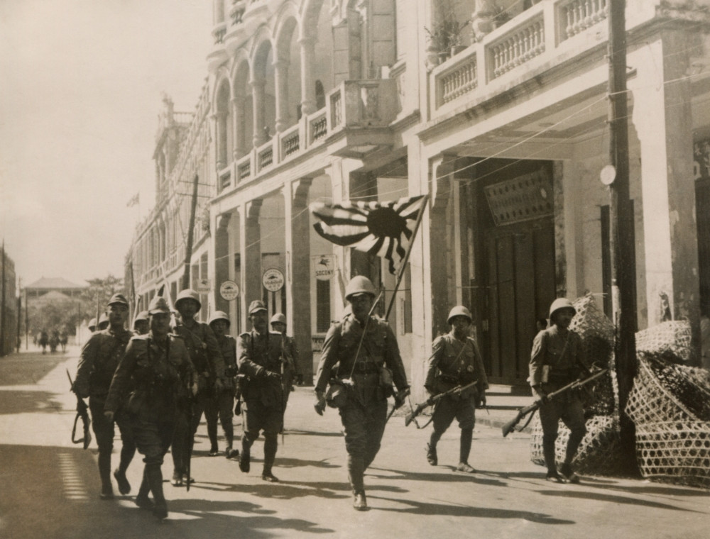 Japanese Troops March In The Streets Of Hainan Island With A Rising Sun ...