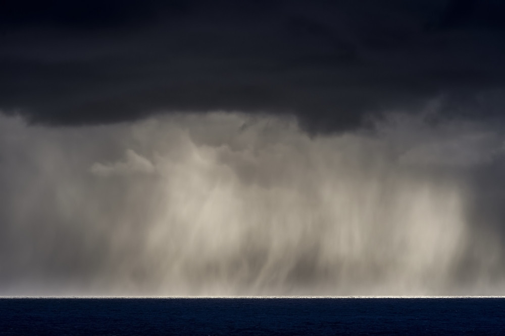 Rain Falls Over The Ocean; Cannon Beach, Oregon, United States Of ...