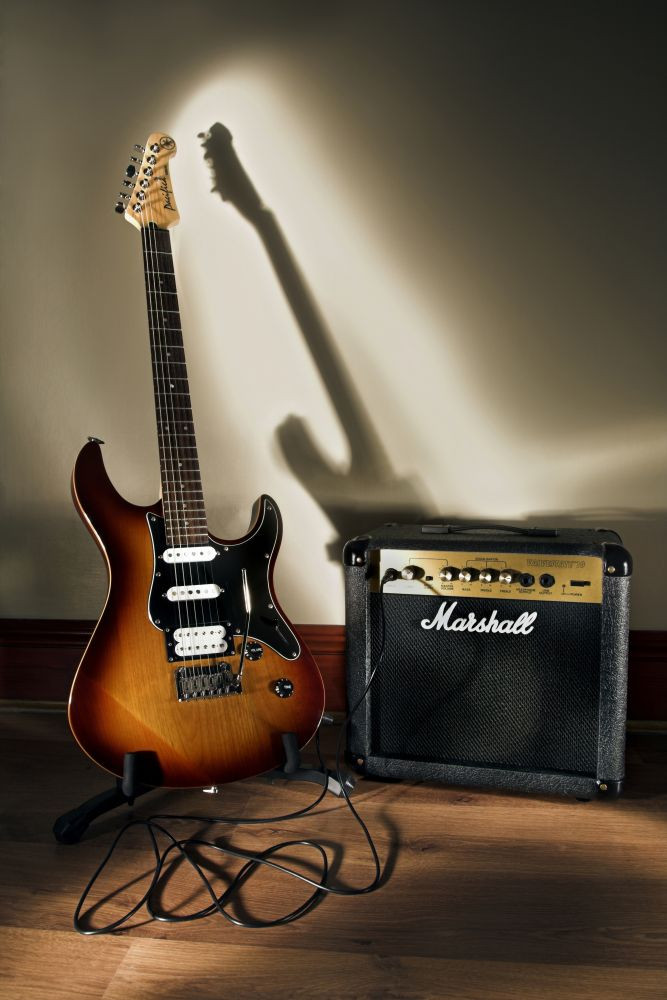 Electric guitar and amplifier. Poster Print by Loop Images Ltd. (11 x ...