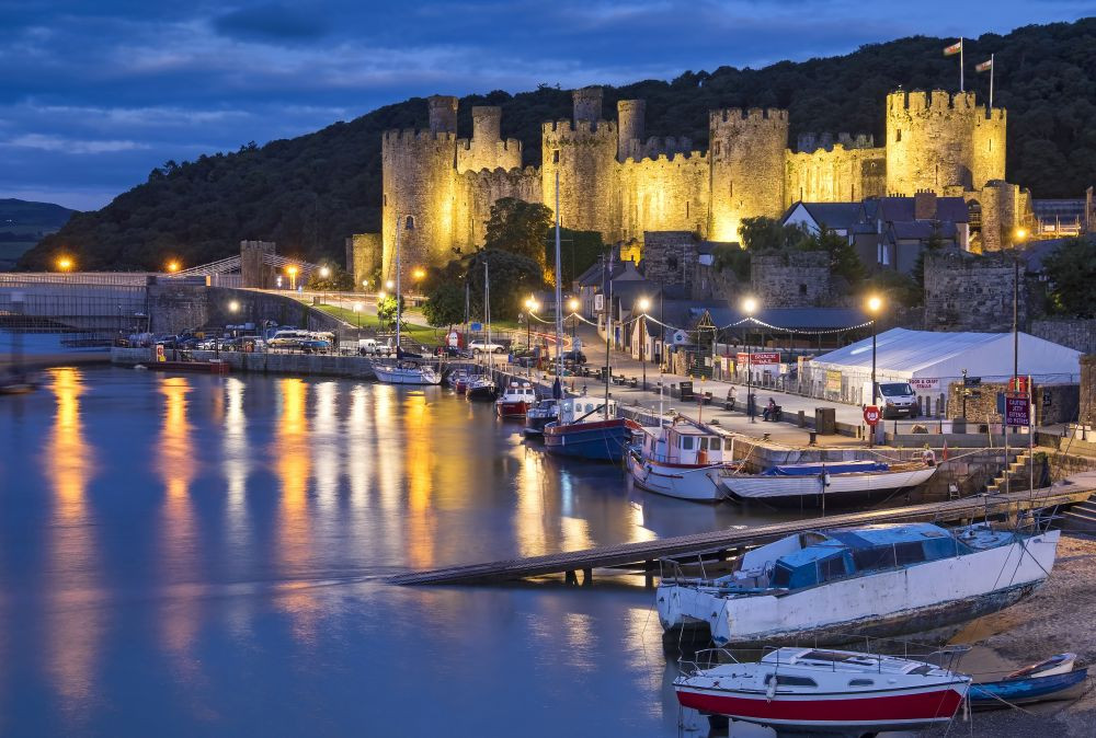 Conwy Castle and Conwy harbour at night. Poster Print by Loop Images ...