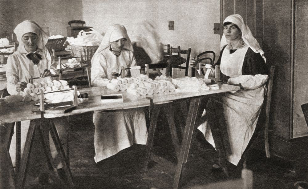 Women volunteers making hospital requisites for the St. John Ambulance ...