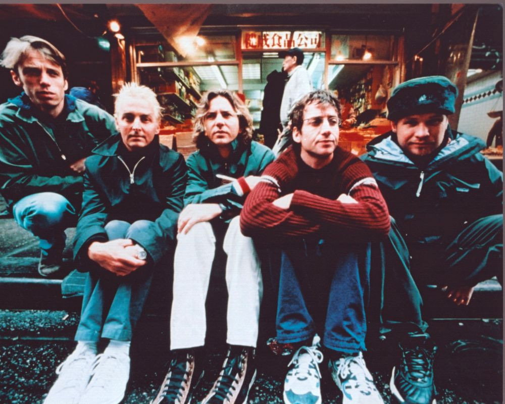 Pearl Jam Group Sitting On Curb Photo Print (8 x 10) - Posterazzi