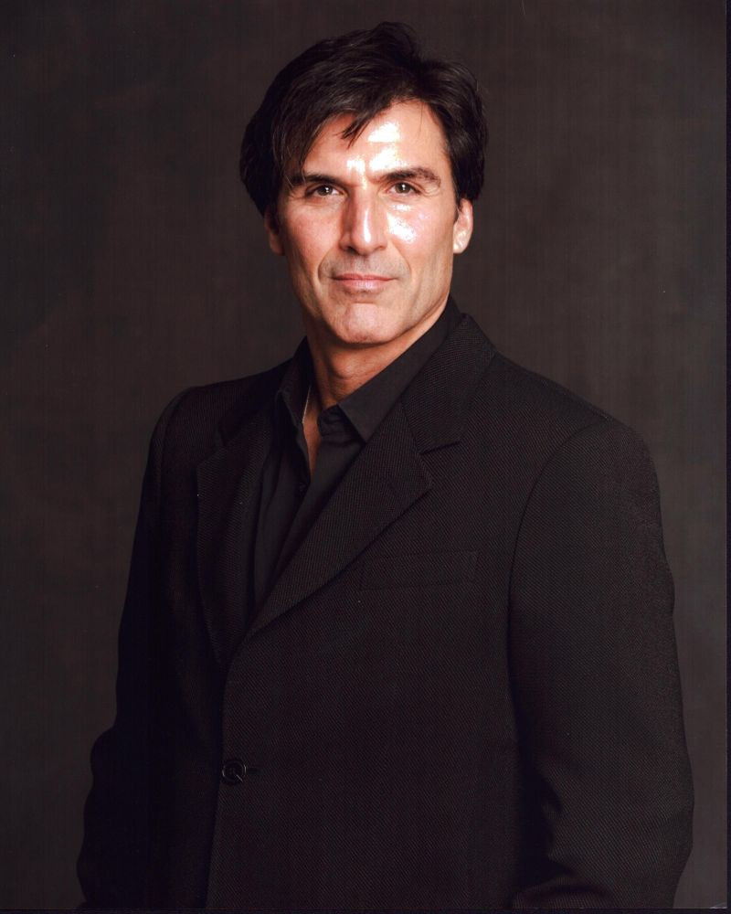 Vincent Irizarry In Black Suit Photo Print (8 x 10) - Posterazzi