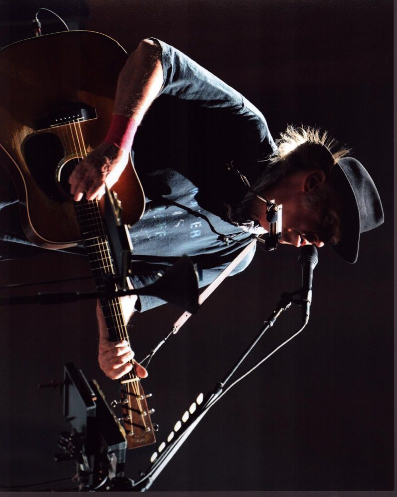 Neil Young Performing On Stage Photo Print (8 x 10) - Posterazzi