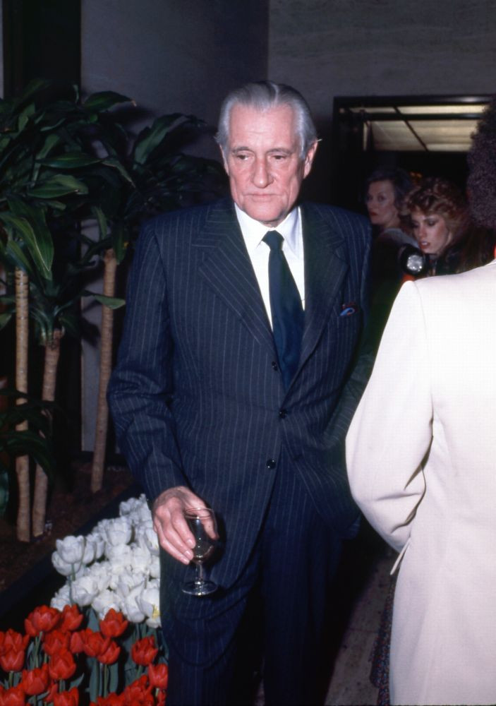 CBS News journalist and author Eric Sevareid at event holding wine ...