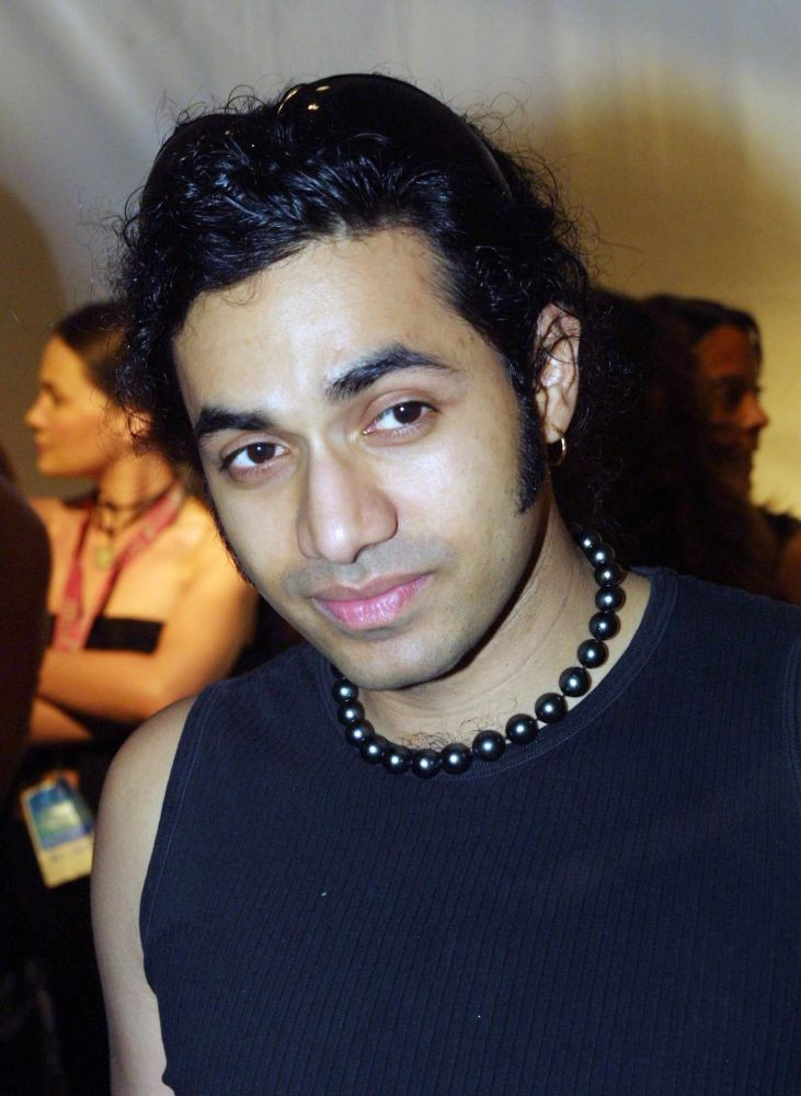 Anand Jon preparing his models before his fashion show during Fashion ...