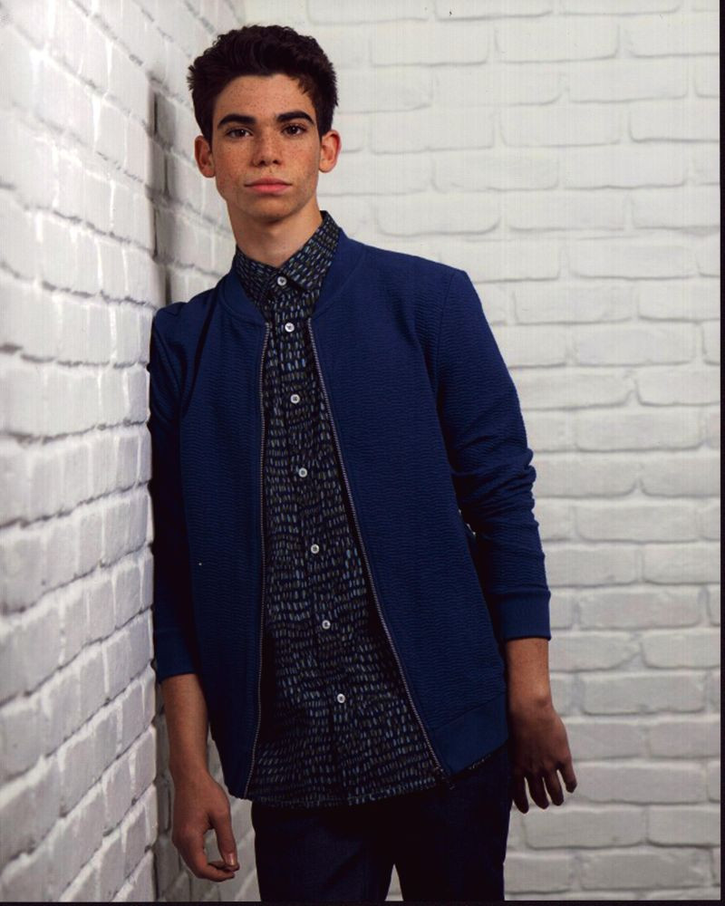 Cameron Boyce Leaning On White Wall Photo Print - Item # MVM59400 ...