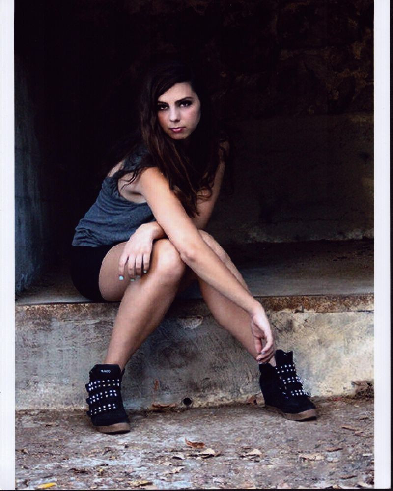 Taylor Hay Sitting On Step Photo Print - Item # MVM70329 - Posterazzi