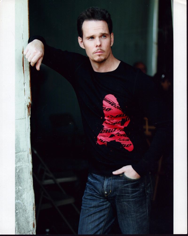 Kevin Dillon Leaning On Wall In Black And Red Top Photo Print - Item ...