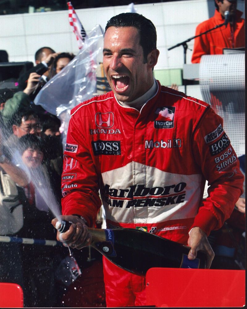 Helio Castroneves With Champagne Photo Print - Item # MVM56664 - Posterazzi