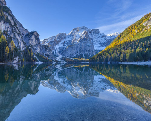 Lakeside path with Croda del Becco (Seekofel) reflected in Braies Lake ...