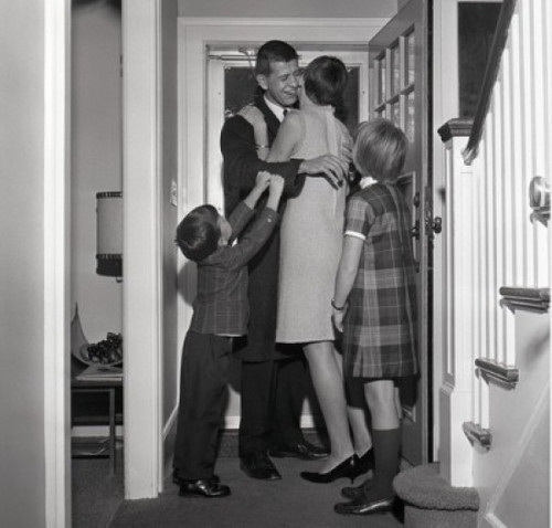 Kids with mother greeting father coming back home Poster Print - Item ...