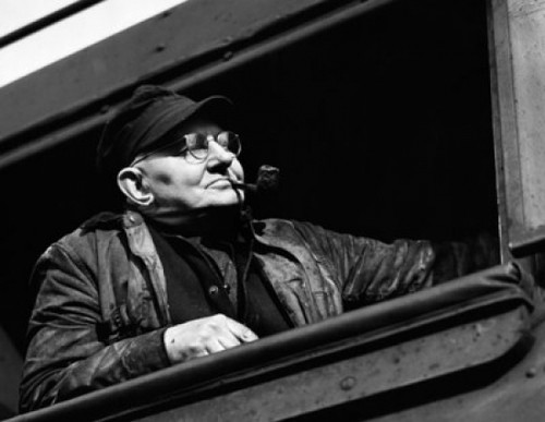 Train conductor leaning out of engine window Poster Print - Item ...