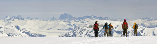A Snowboarder And Skiers Hike Along The West Ridge Of Mt. Hawthorne ...