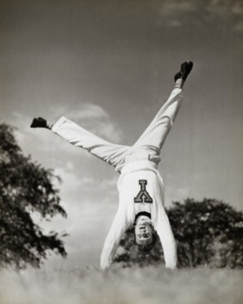 Male cheerleader doing a cartwheel Poster Print - Item # VARSAL2553672 ...