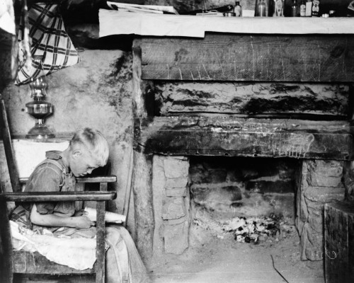Boy Reading, 1940. /Na Farmer'S Son Reading In Front Of A Fireplace In ...