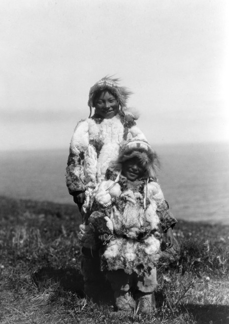 Alaska: Eskimos, C1929. /Na Young Child And An Older Eskimo Wearing ...