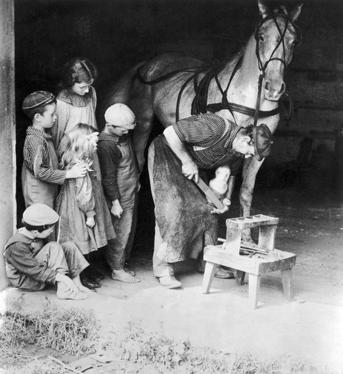 Blacksmith, 1900./Nphotograph, American. Poster Print by Granger ...