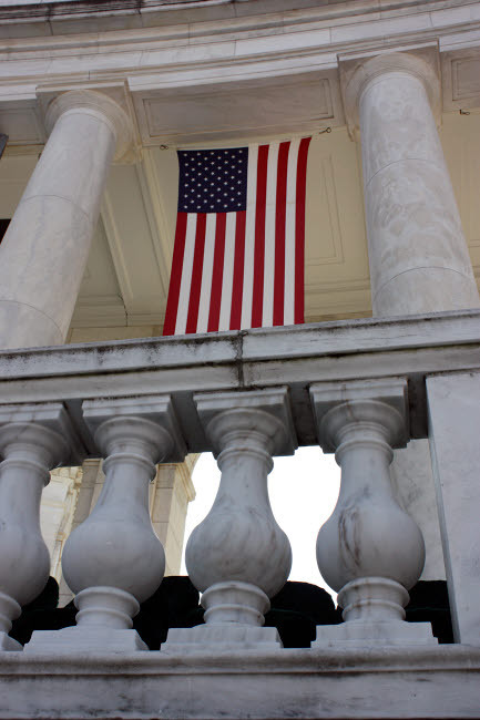 American Flags hang in the Amphitheatre at Arlington National Cemetery ...