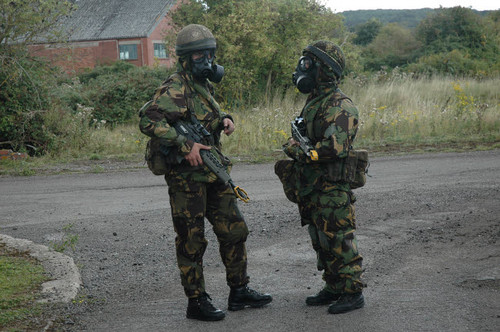Two British soldiers in full NBC protection gear Poster Print by Andrew ...