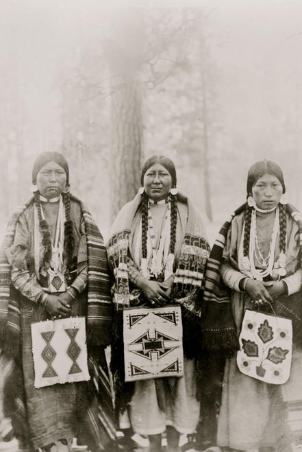 Three Native American women, standing, full-length, facing front ...