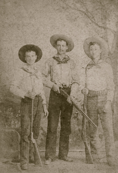 Three Armed And Dangerous Young Texas Cowboys. Three Young Men Dressed ...