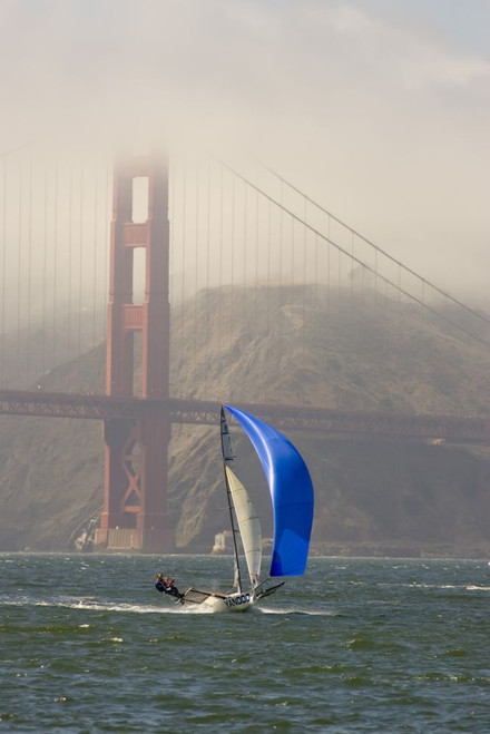 A Skiff sails in the San Francisco Bay near the Golden Gate Bridge; San ...