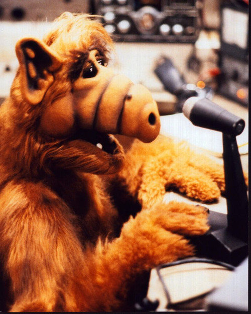 Alf Talking Into Intercom Photo Print (8 x 10) - Posterazzi