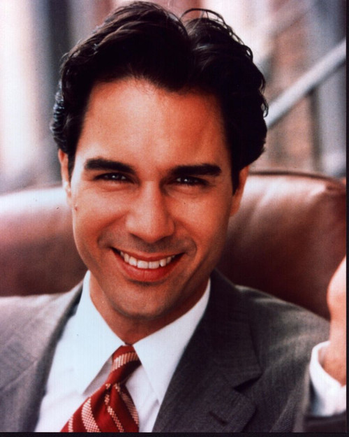 Eric Mccormack In Gray Suit With Red Tie Photo Print (8 x 10) - Posterazzi