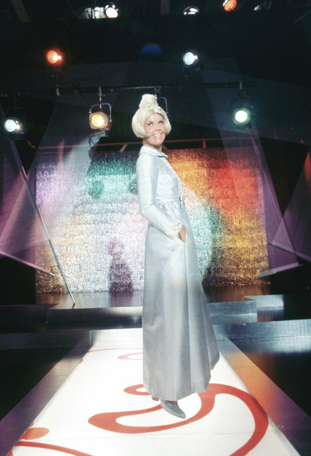 Doris Day smiling on the runway modeling a full length gown and her up ...