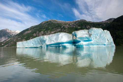 Huge iceberg slowly melts in Shakes Lake. Poster Print - Betty ...