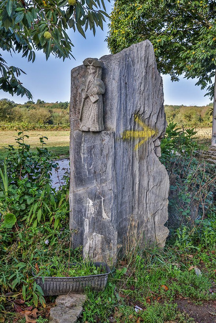 Spain-Galicia Stone carving of a pilgrim along the Camino de Santiago ...