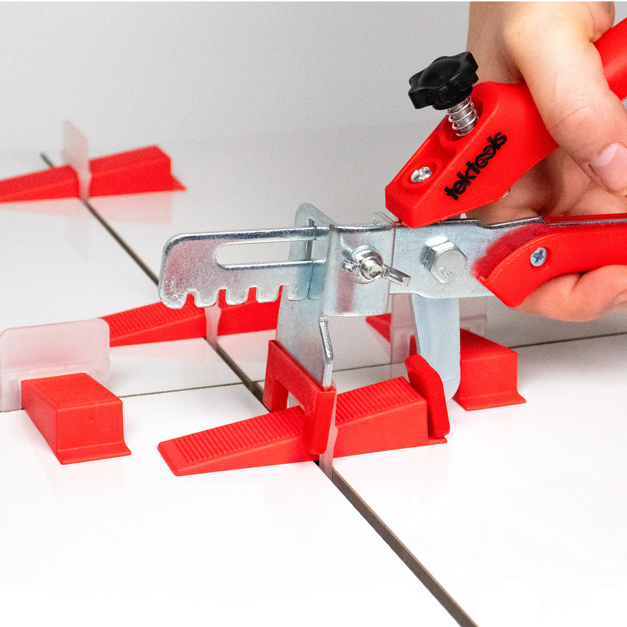 TekTools Tile Levelling System Spacer Clips Reusable Wedges Pliers and a TekTools Drawstring Bag