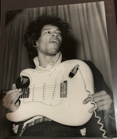 Jimi Hendrix Photograph by Harry Goodwin Stamped/ Mint - The Record Centre