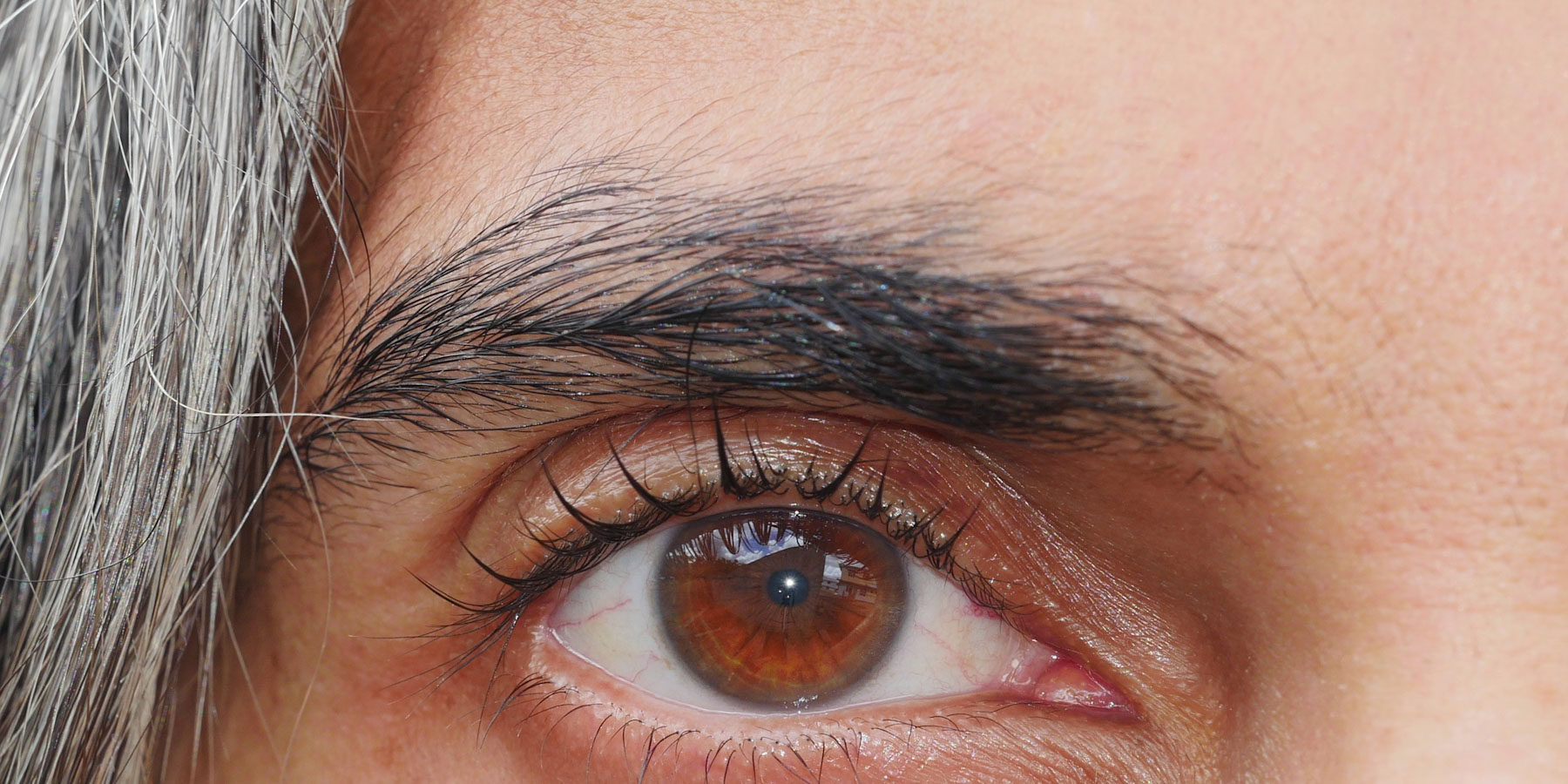 Amber Eyes: Unveiling the Genetics of a Rare Eye Color - Debby Burk Optical