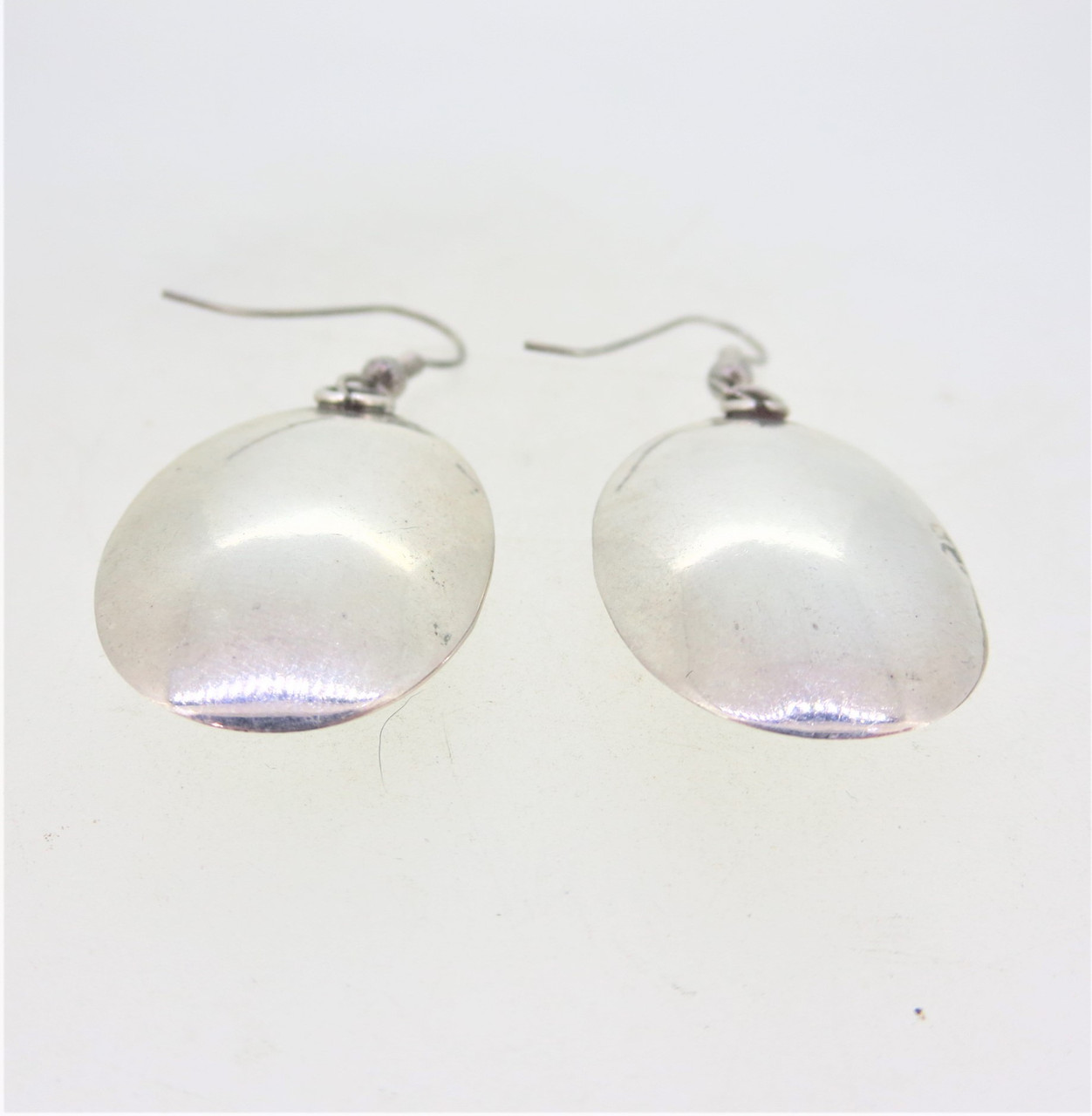 Sterling Silver Kokopelli Earrings Round Shape