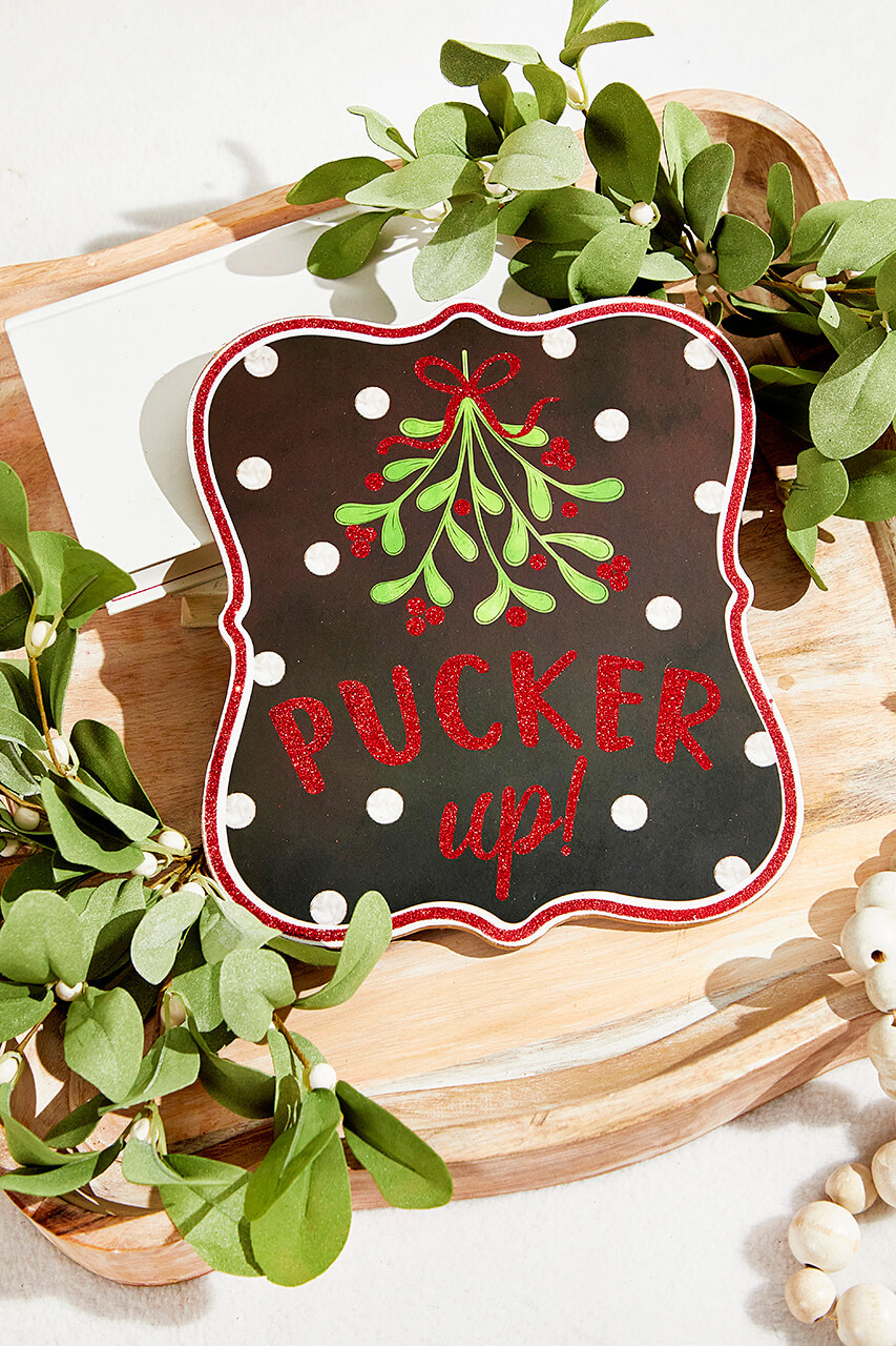 10.5"H x 9"L Glitter Pucker Up Sign - Decorator's Warehouse