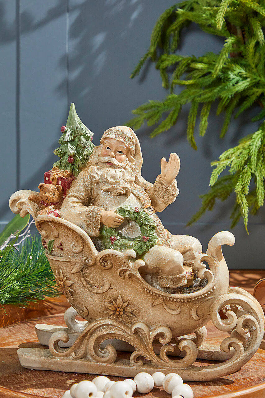 12" Resin Santa in Sleigh - Decorator's Warehouse