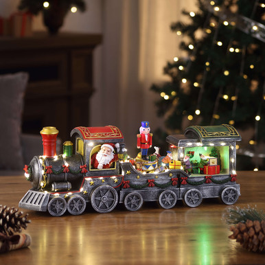 20" Animated Resin Train Santa - Decorator's Warehouse